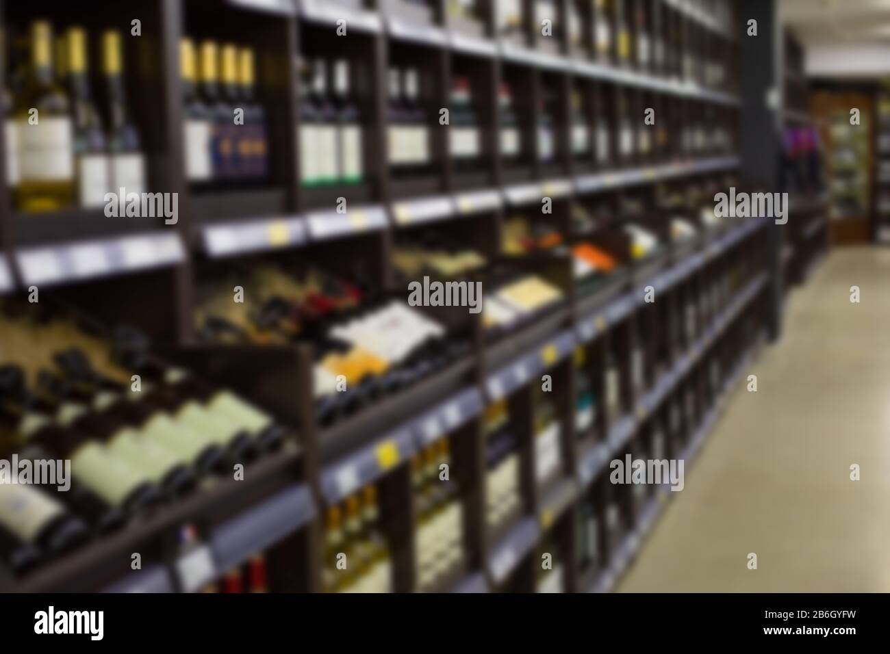 Defocus blurred background, perspective wine cellar, storing bottles of ...
