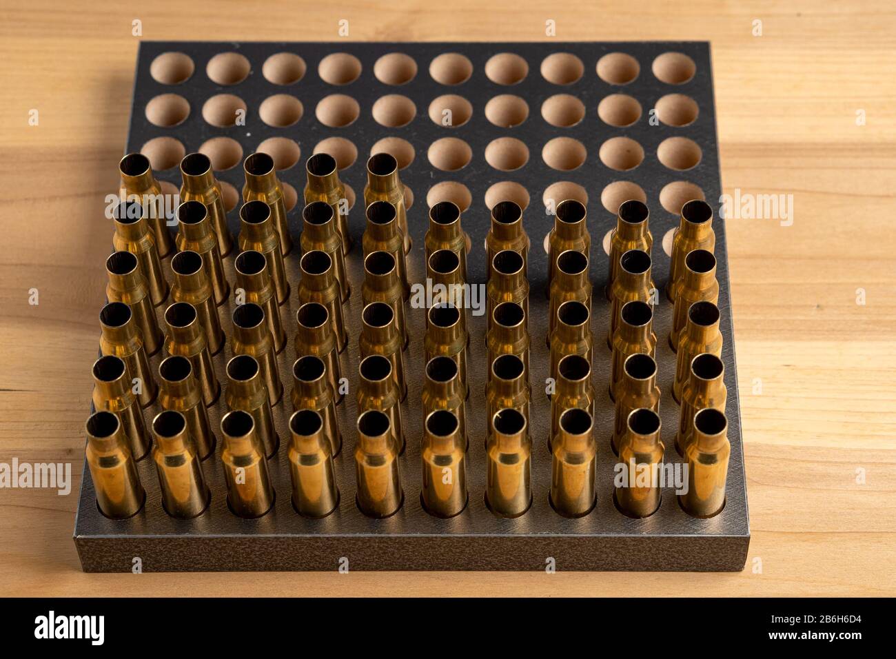 Production of cartridges for a rifle, reload. Many empty shells in the ...