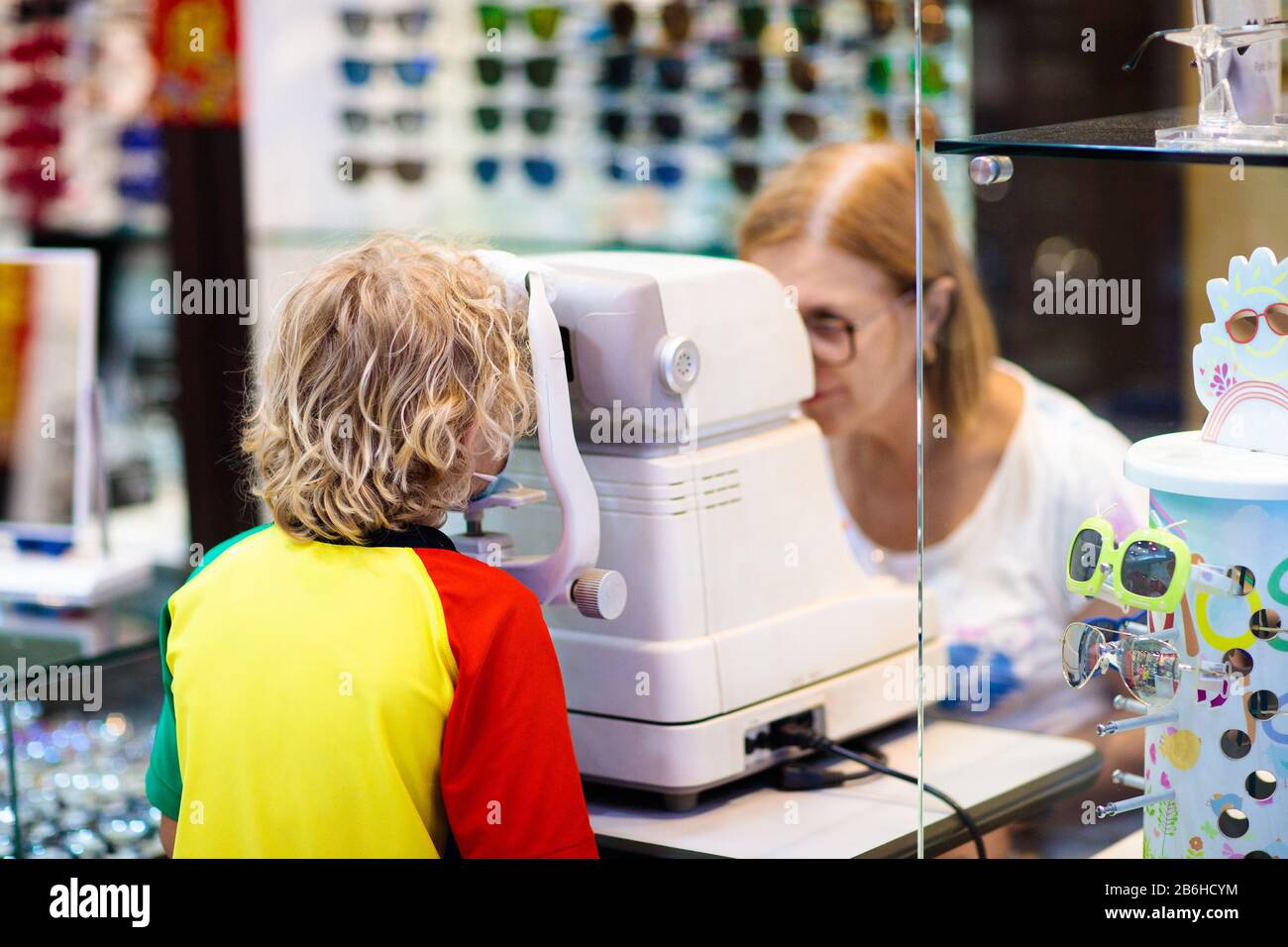 Kids Eye Sight Test Little Boy At Ophthalmologist Office For Eyes kids-eye-sight-test-little-boy-at-ophthalmologist-office-for-eyes