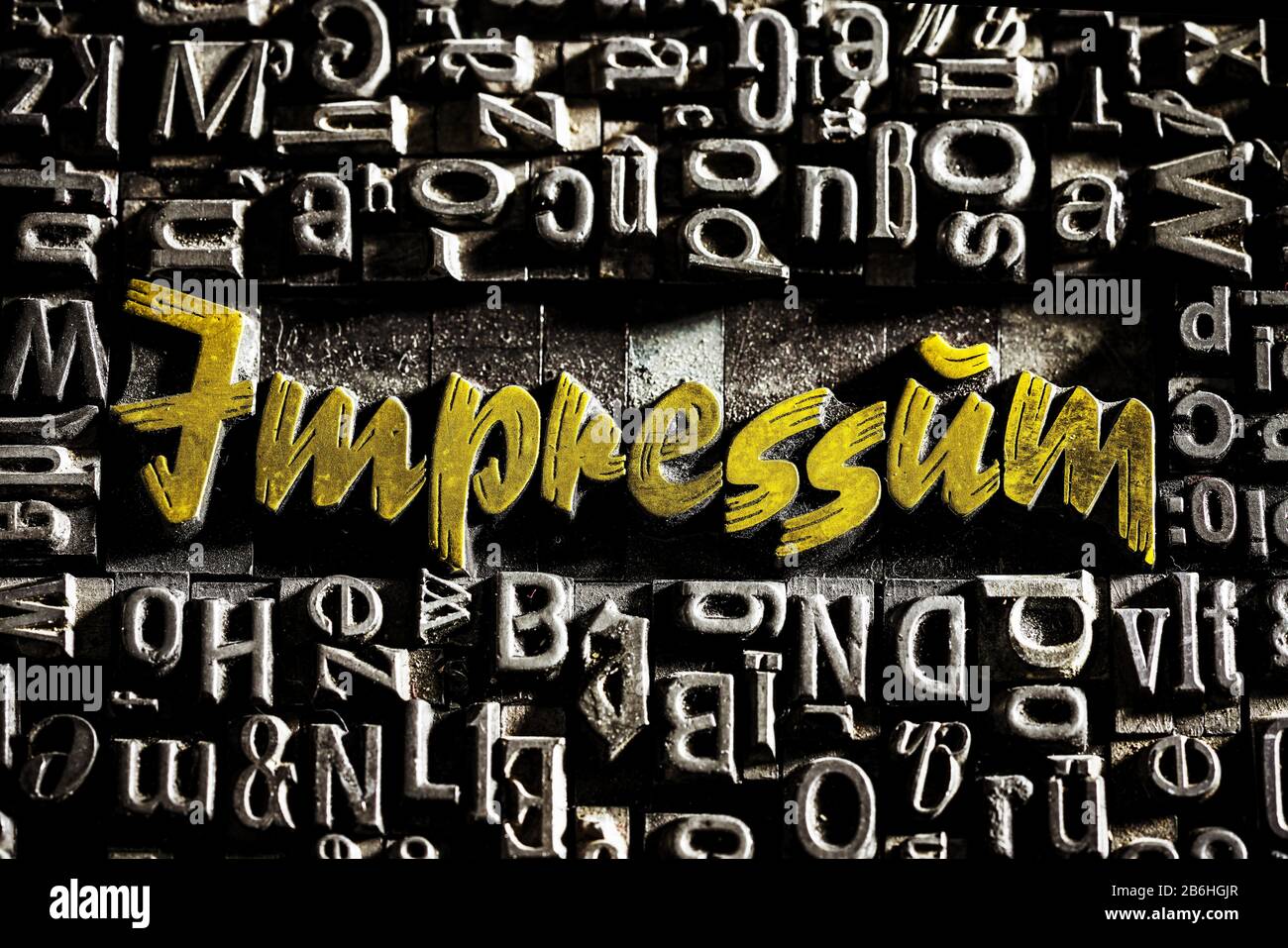 Old lead letters with golden writing show the word imprint, Germany ...