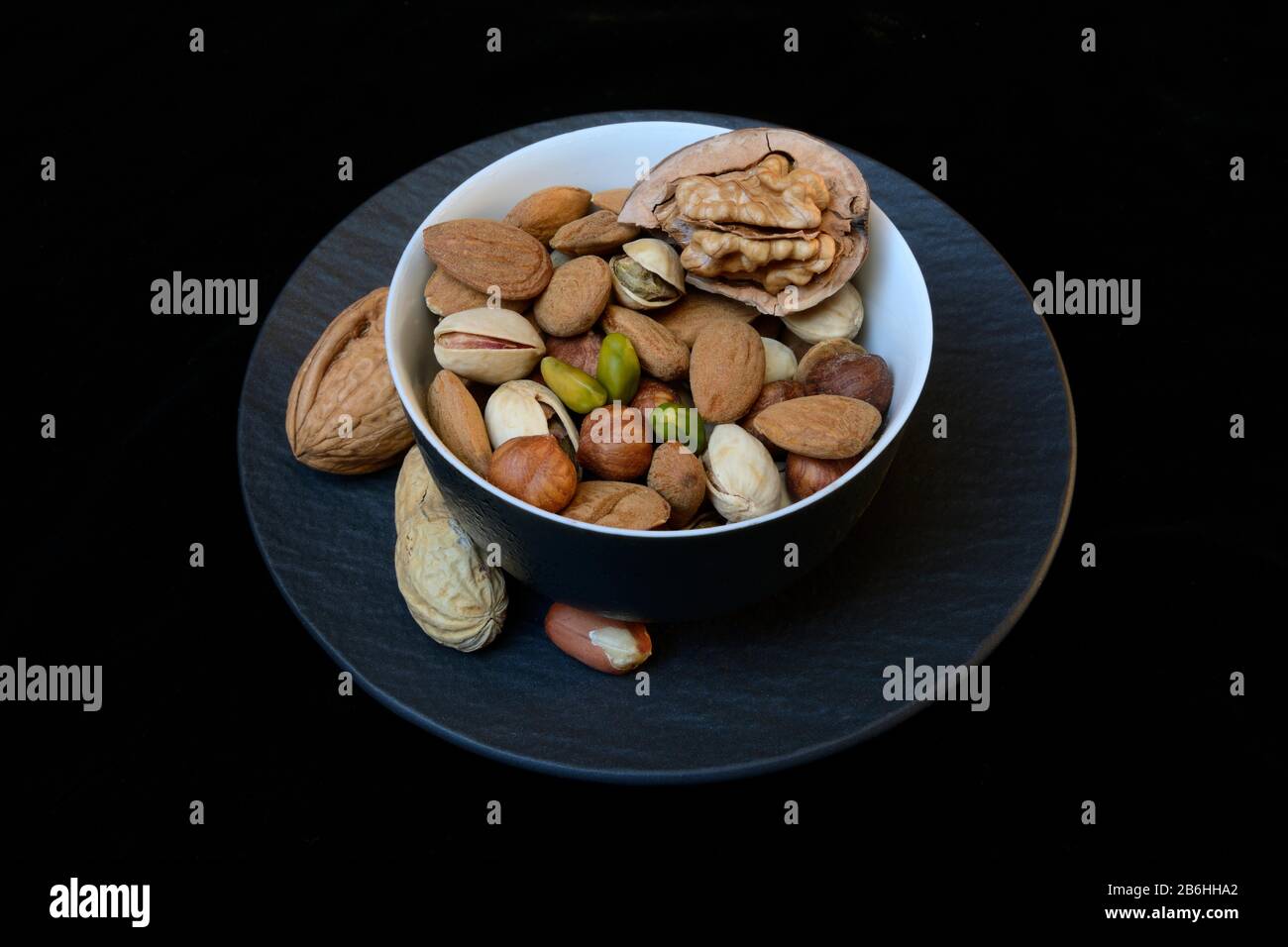 Various nuts on plates hi-res stock photography and images - Alamy