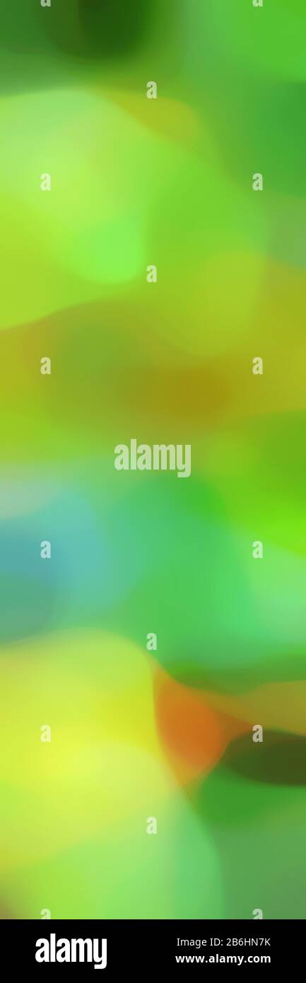 blurred bokeh vertical format background with moderate green, yellow ...