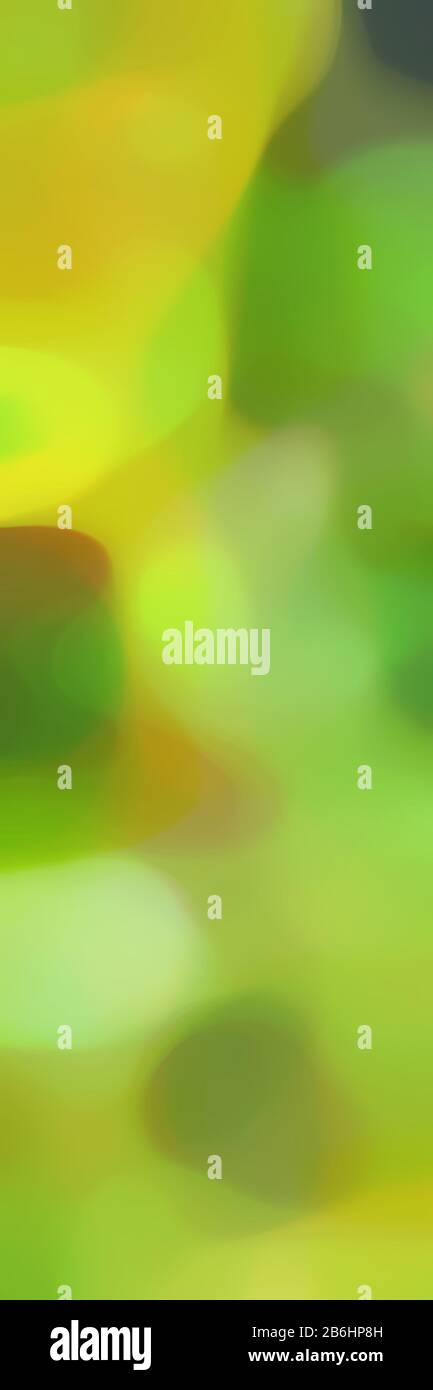 blurred bokeh vertical format background texture with yellow green ...