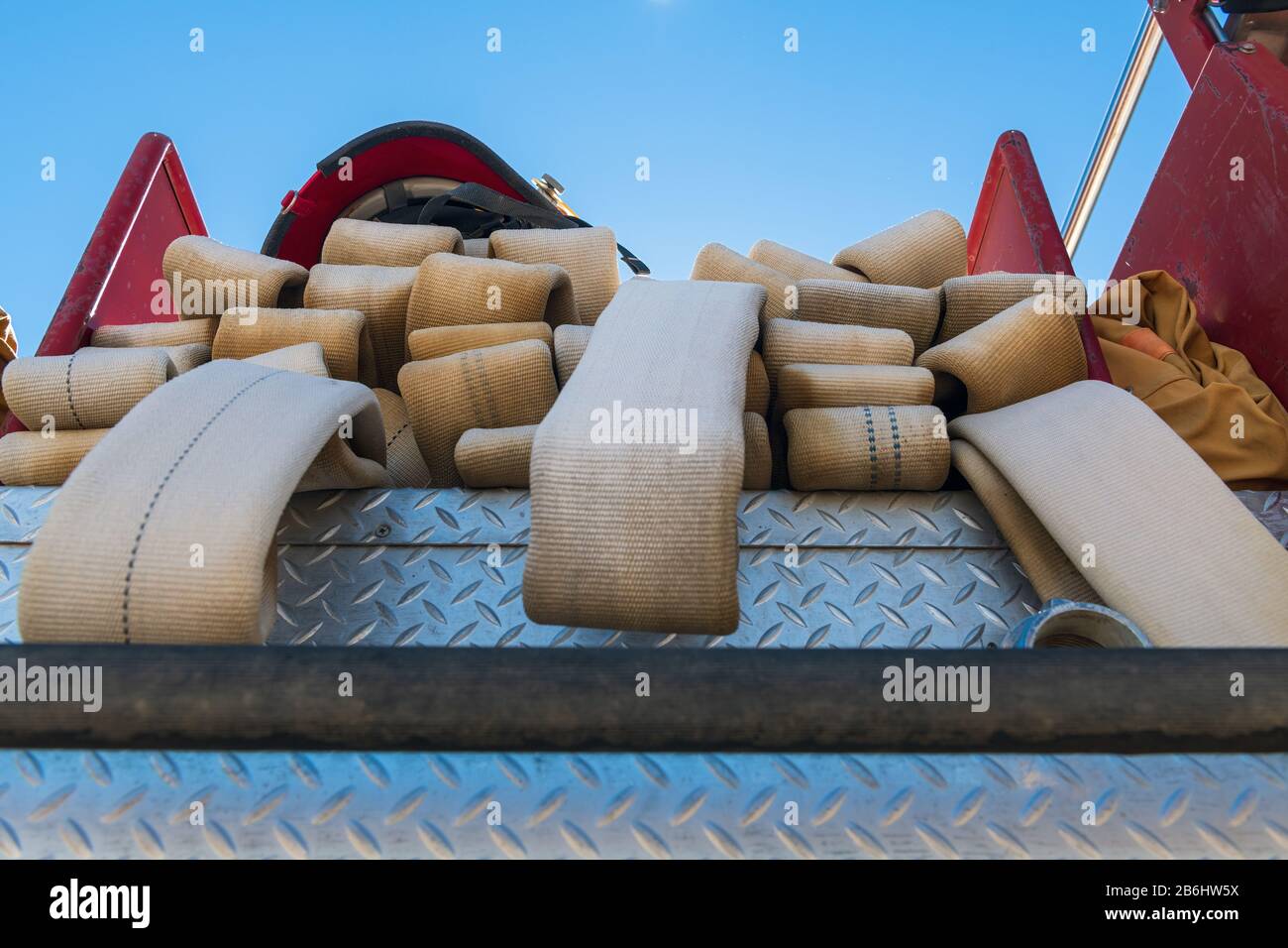 Hoses stacked on a fire truck Stock Photo - Alamy