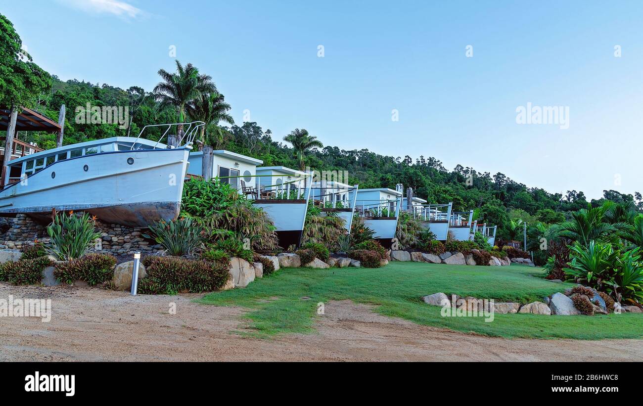 Boat shaped resort architecture near the beach amongst landscaped ...