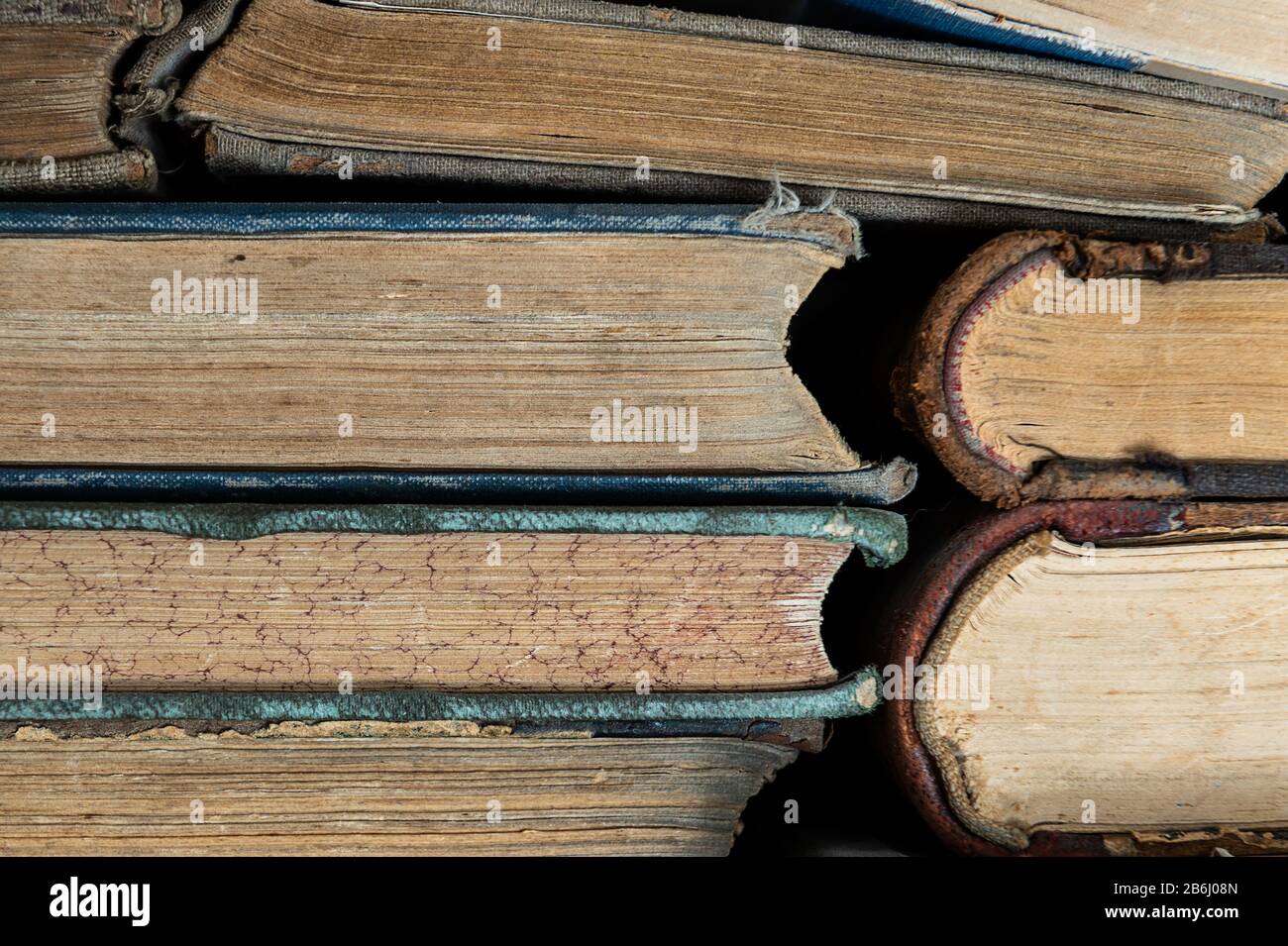 stack of old books on a library shelf Stock Photo - Alamy