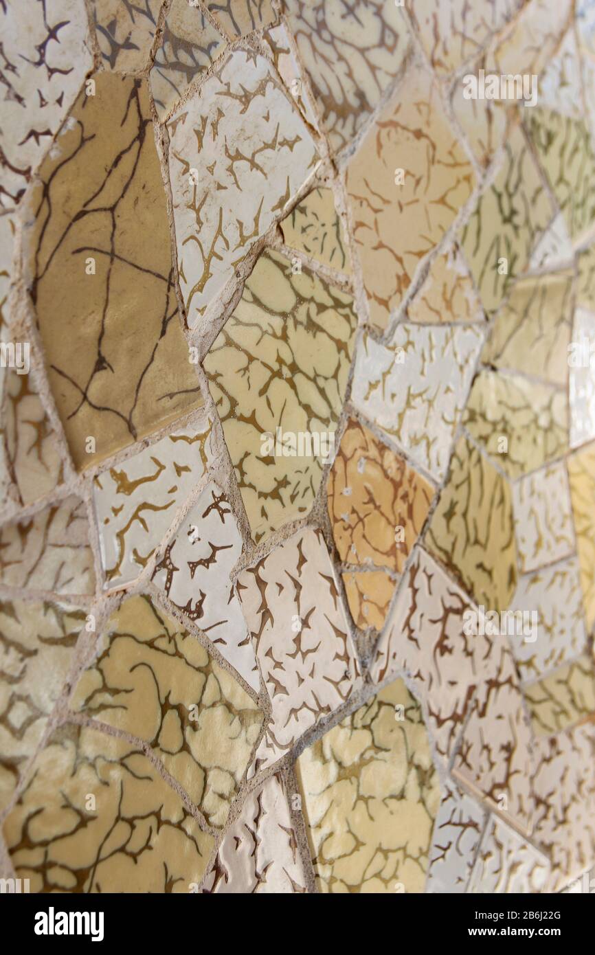 Broken glass mosaic tiles as ceramic art in Park Guell, Barcelona ...
