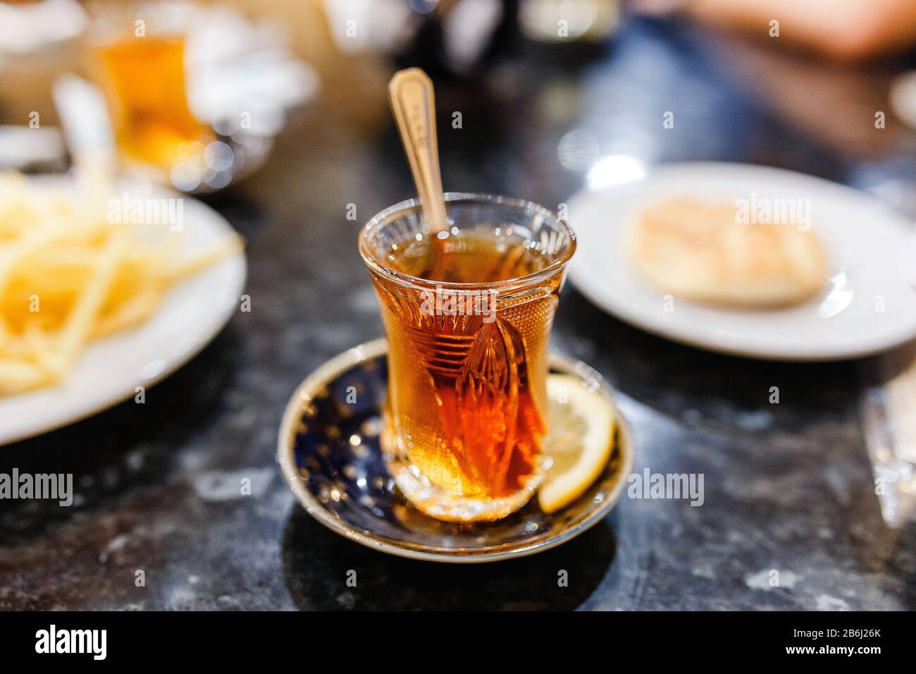 Turkish authentic tea in a traditional glasses in cafe Stock Photo - Alamy