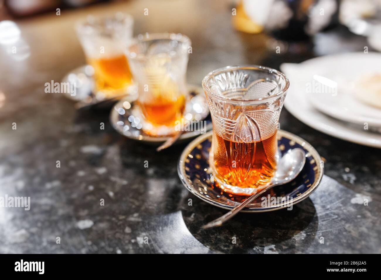 Turkish authentic tea in a traditional glasses in cafe Stock Photo - Alamy