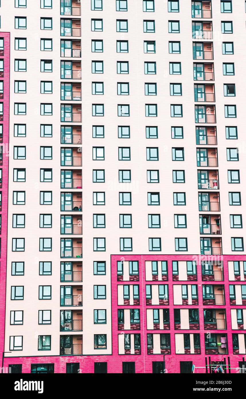 Modern high-rise pink house Stock Photo - Alamy