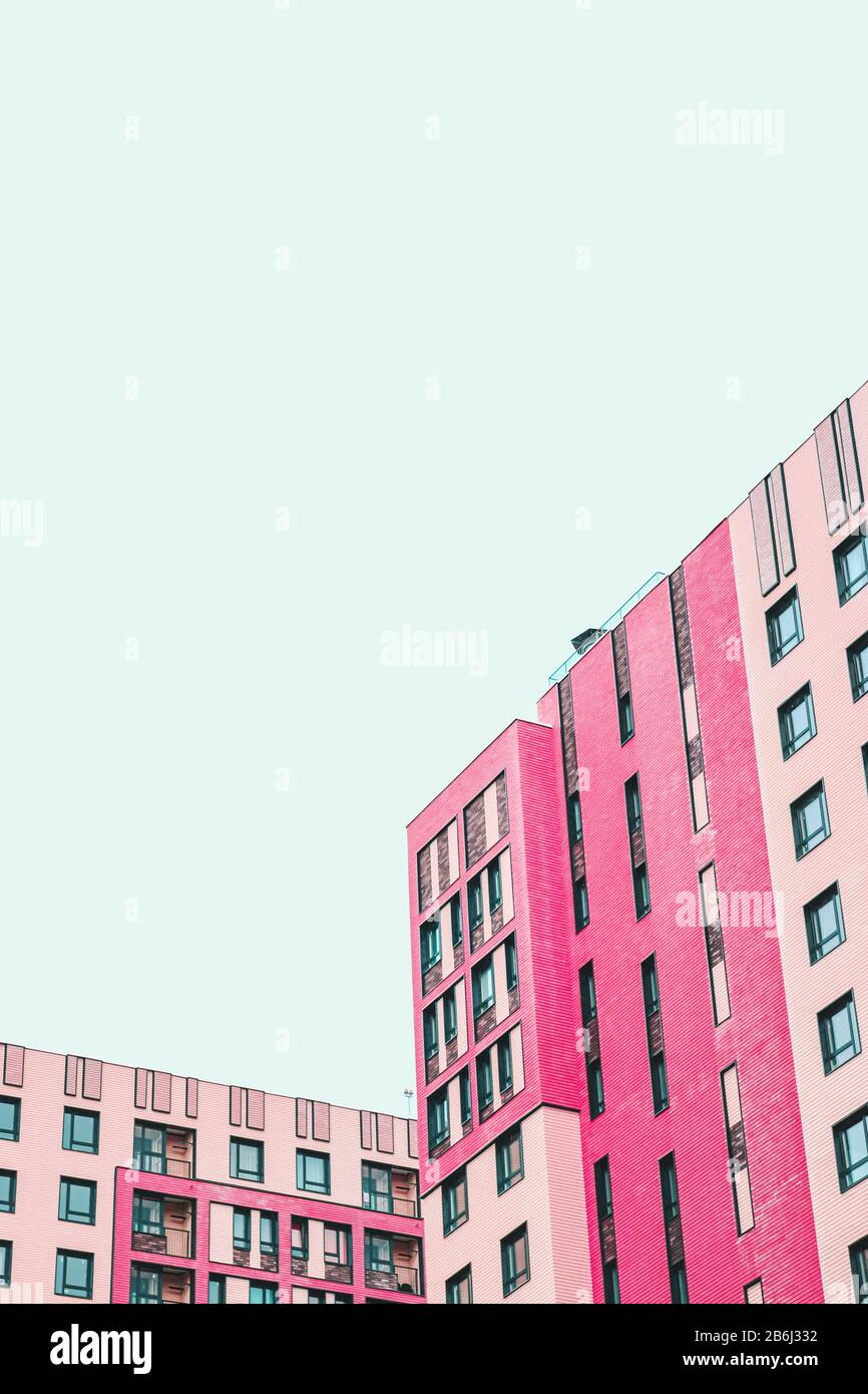 Modern high-rise pink house Stock Photo - Alamy