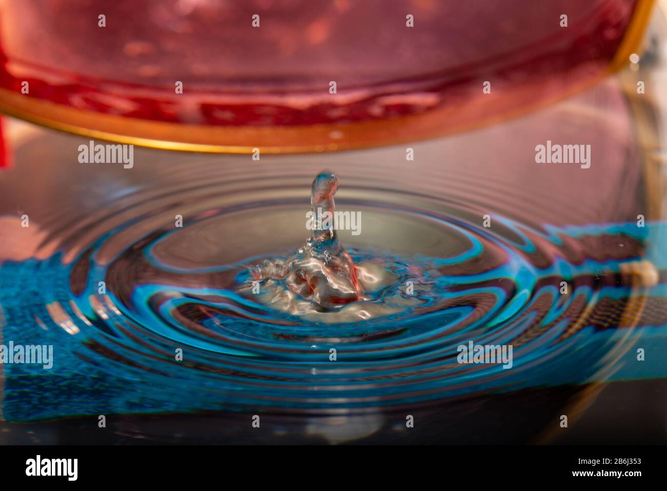 drops bouncing in the water Stock Photo - Alamy