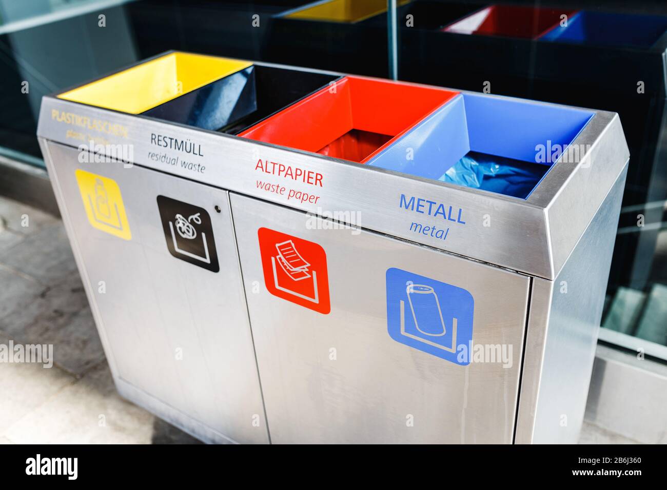 Different Colored Bins For paper, plastic and metal, Recycle concept ...
