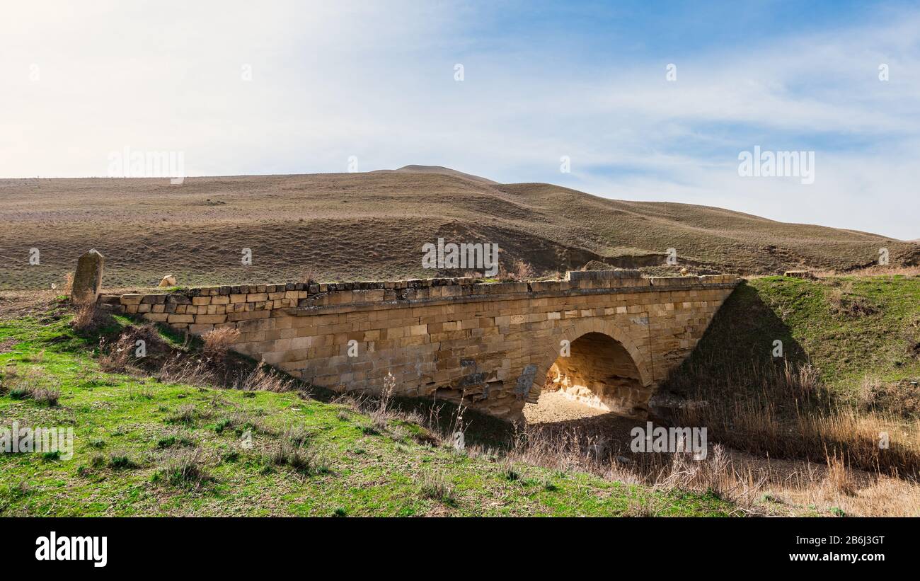 Old stone bridge over the dried river Stock Photo - Alamy