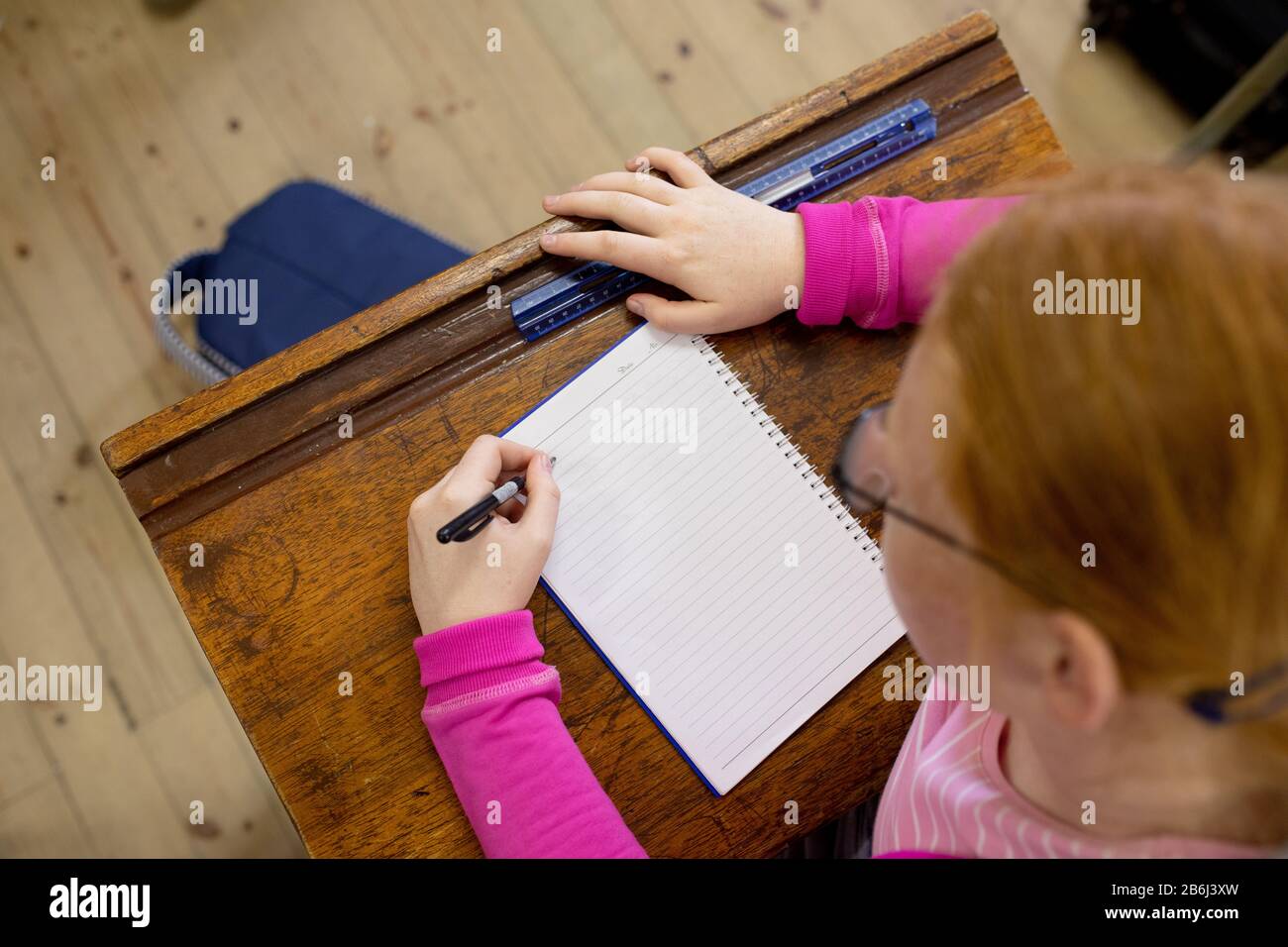 Class writing hi-res stock photography and images - Alamy