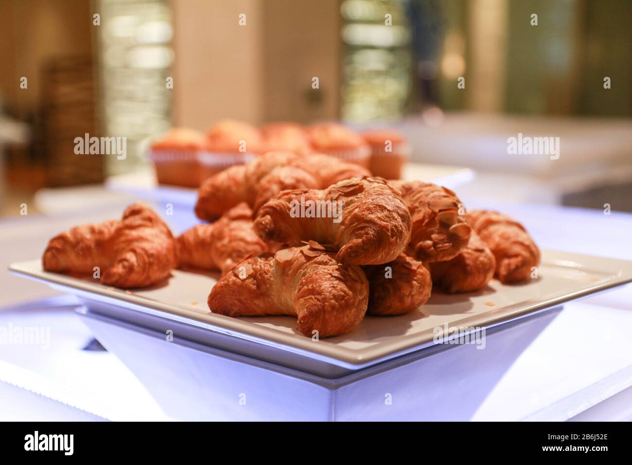 Stack of croissants in a hotel breakfast buffet on a white plate Stock ...