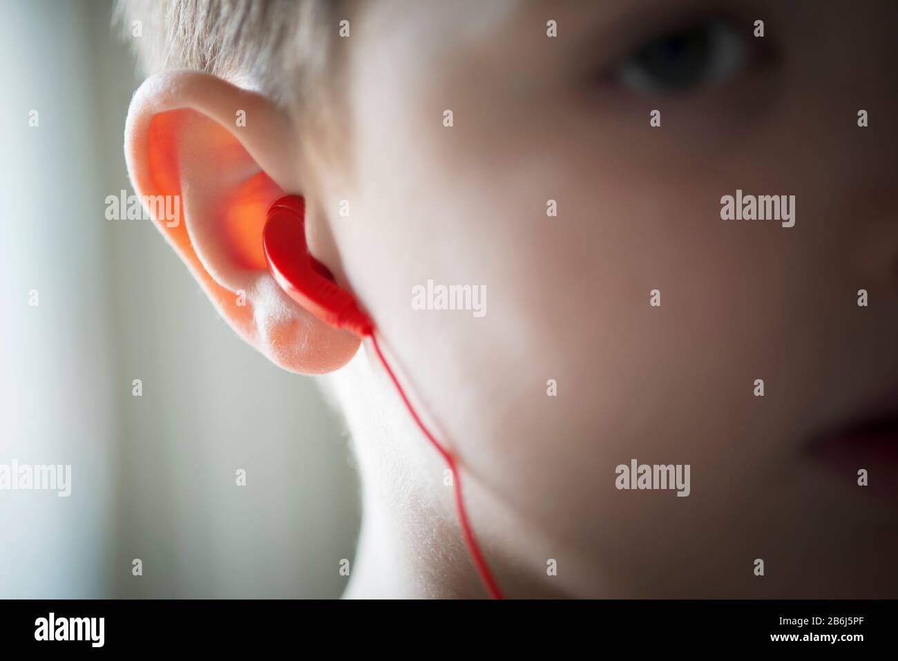 Little Boy and Ear Phones Stock Photo - Alamy