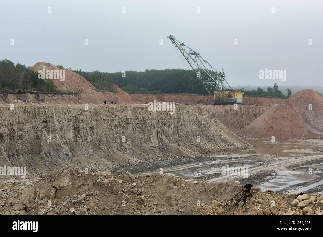 Landscape view of limestone quarry with large excavator machinery, high ...