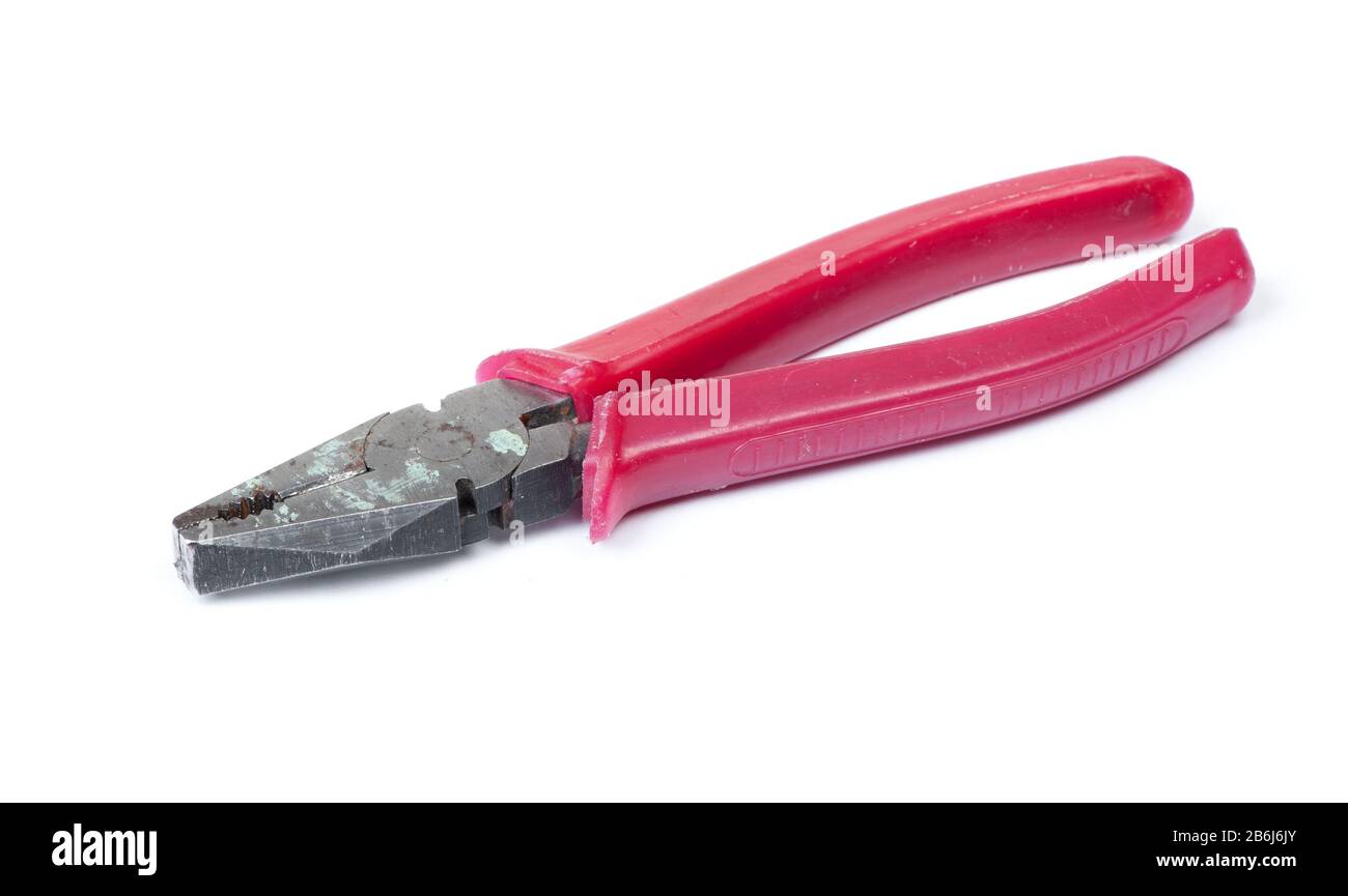 Old pliers with red handle isolated on white background Stock Photo - Alamy