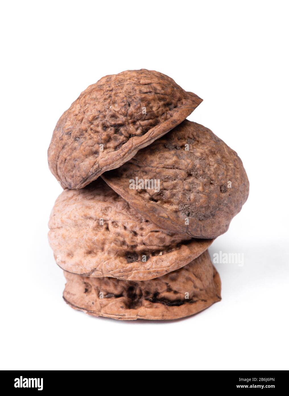 Empty walnut shells isolated on a white background Stock Photo - Alamy