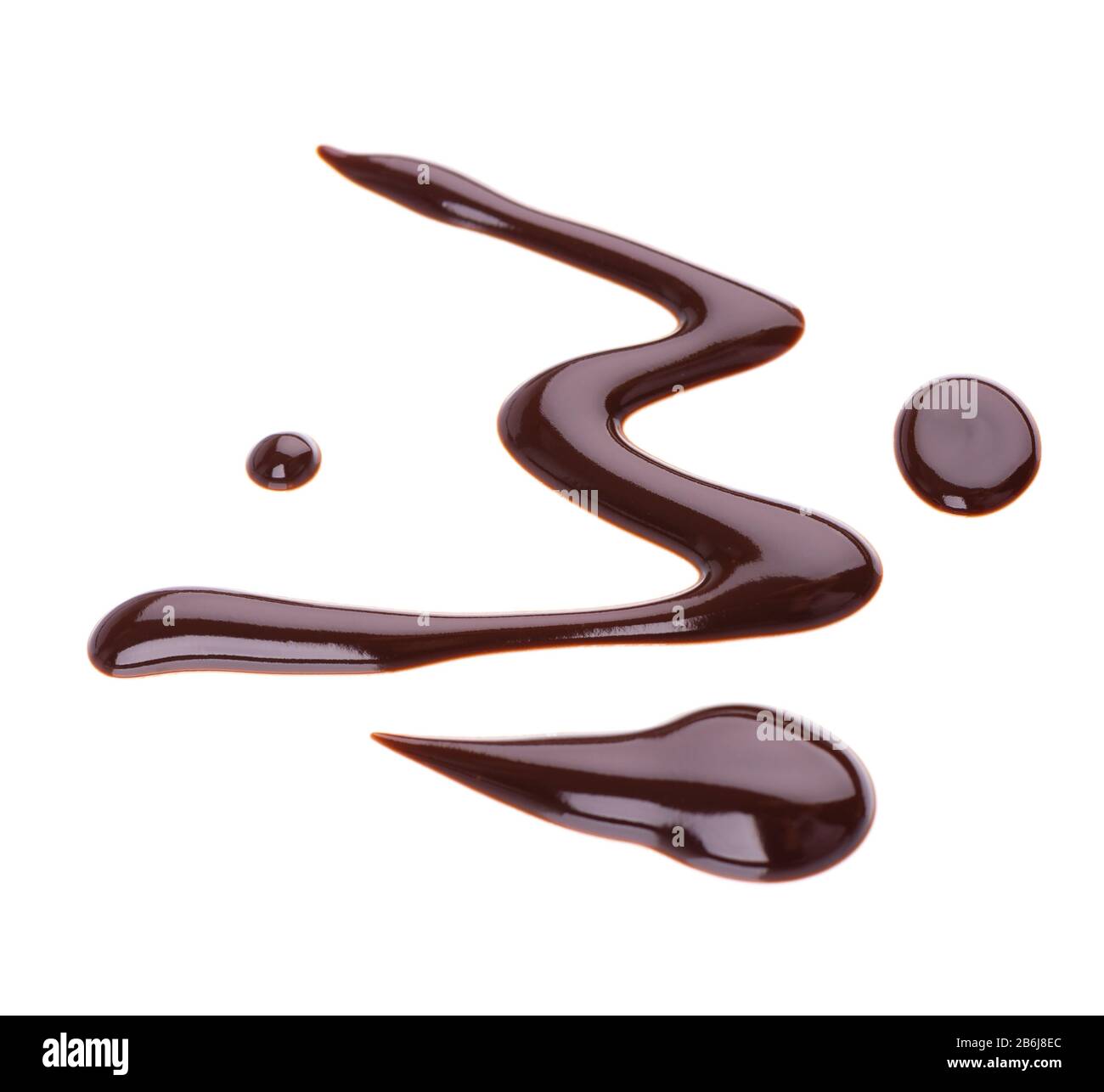Chocolate syrup drizzle isolated on white background. Splashes of sweet ...