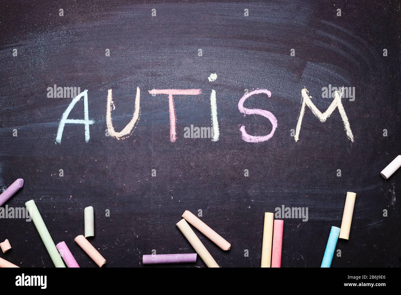 The word autism is written on a chalk board Stock Photo - Alamy