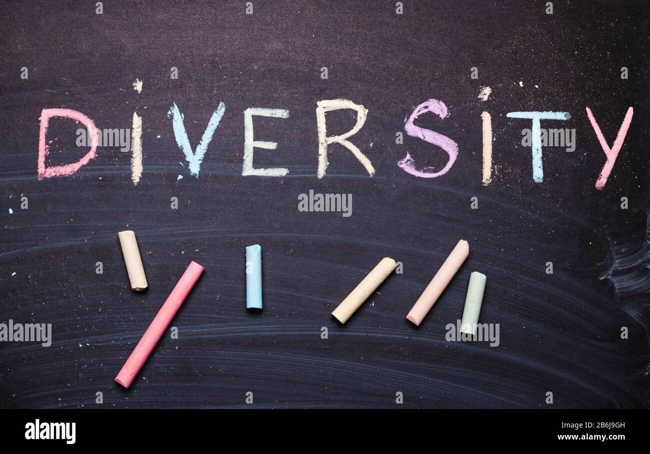 The word diversity is written in chalk on a blackboard Stock Photo - Alamy