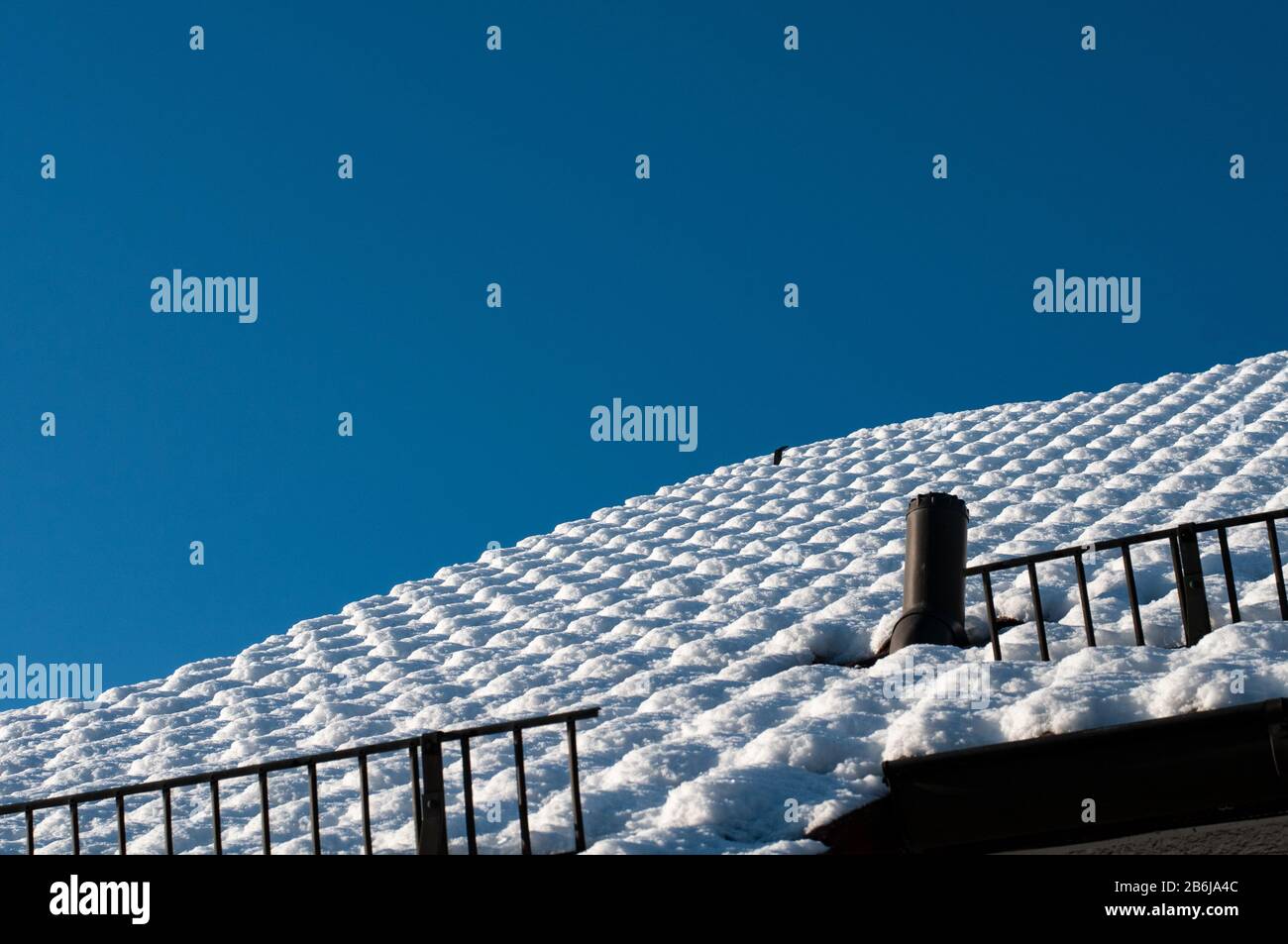 Snow guard on the roof with snow hi-res stock photography and images ...