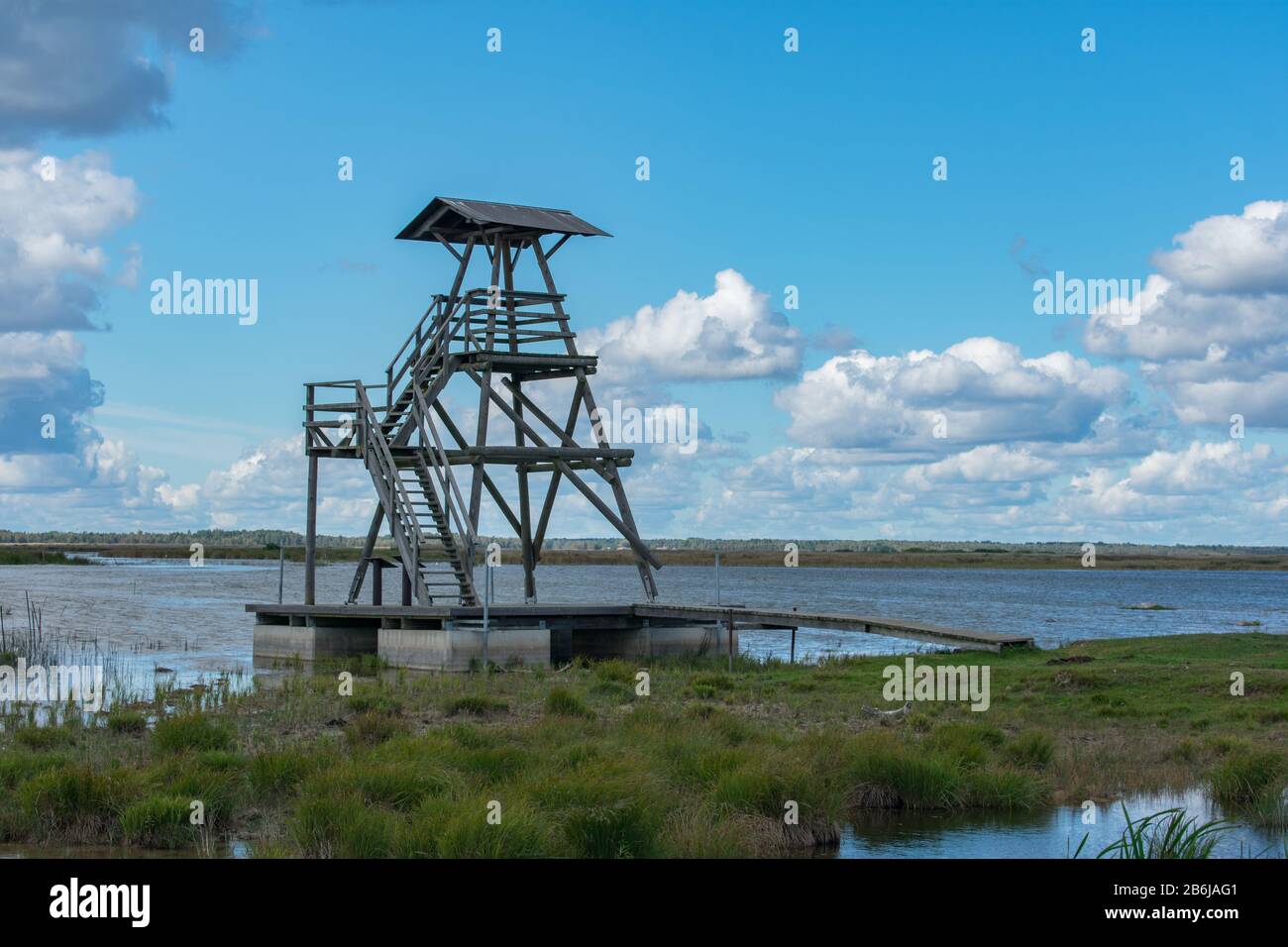 Floating wooden viewing tower on water. Engure Lake Nature Park, Latvia ...