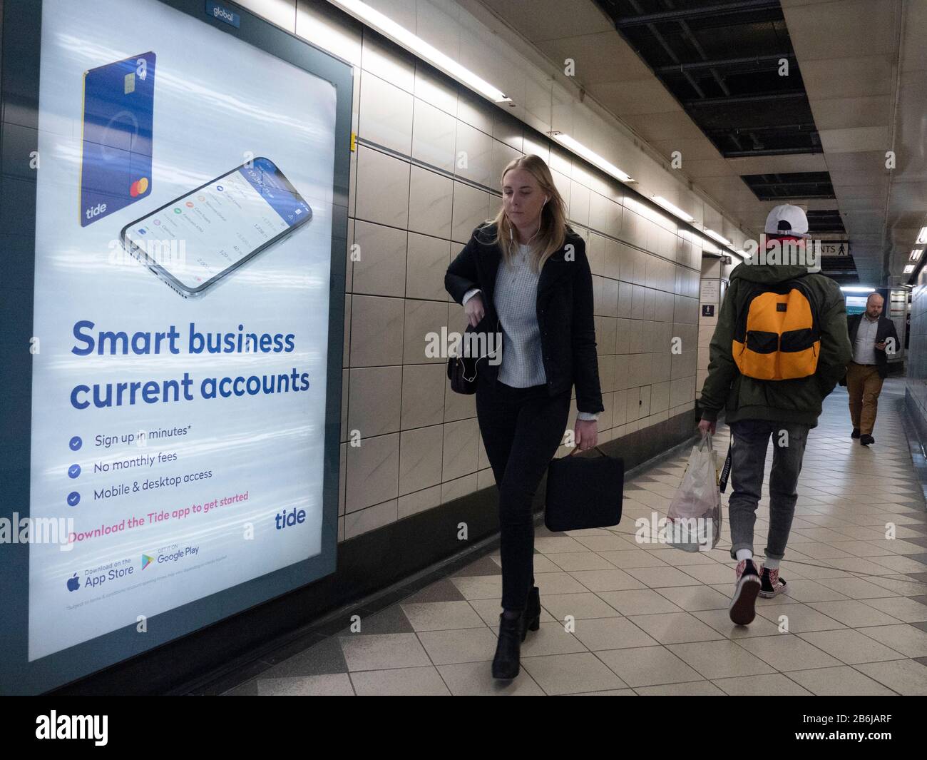 Tide bank advert on advertising hoarding, London, UK Stock Photo - Alamy