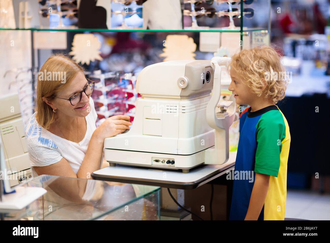 Kids eye sight test. Little boy at ophthalmologist office for eyes ...