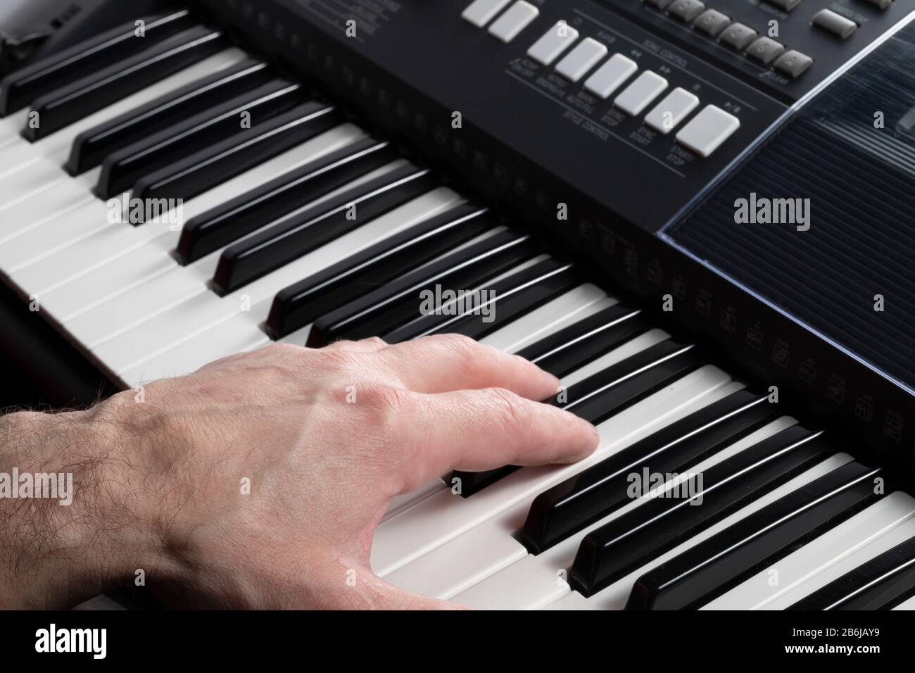 Synthesizer keyboard player performing hi-res stock photography and ...
