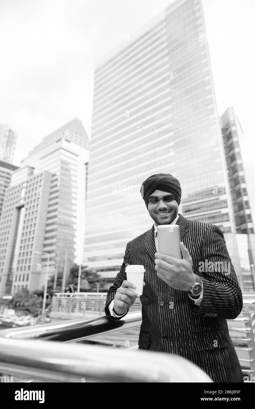 Coffee happy businessman phone Black and White Stock Photos & Images ...