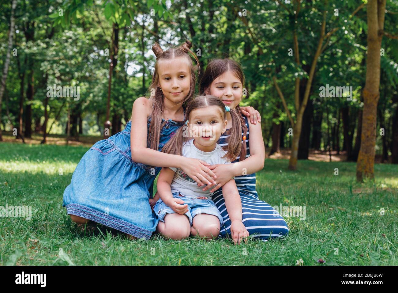 Three girls playing outdoor hi-res stock photography and images - Alamy