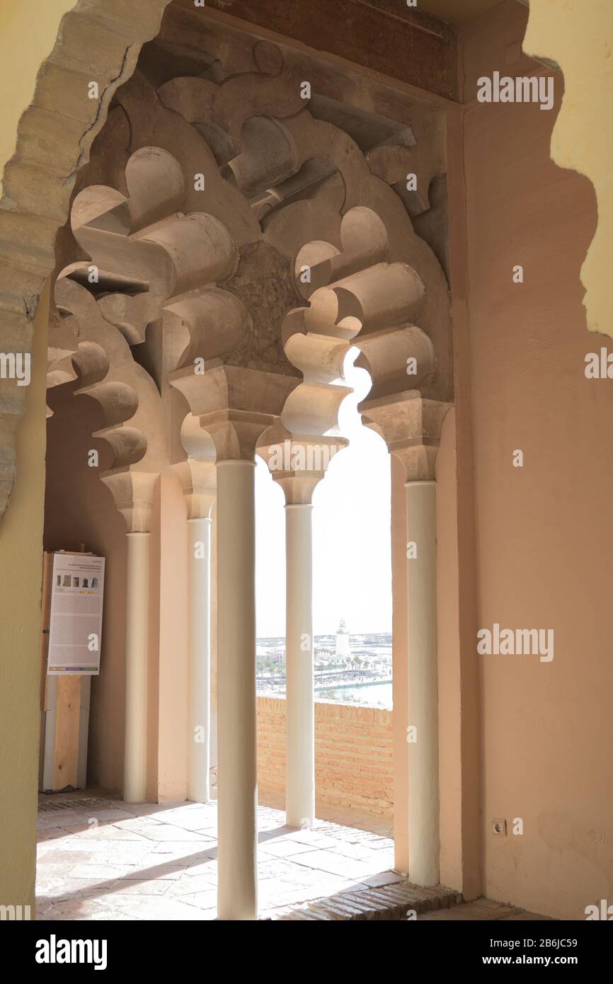 Multifoil arches of Nasrid style in ancient muslim palace of Alcazaba ...