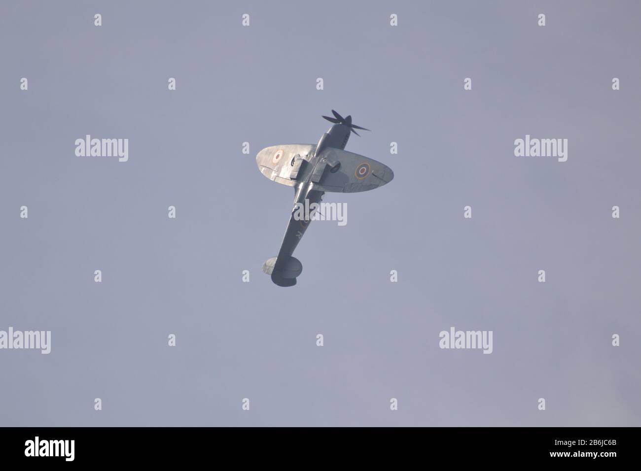 Spitfire climbing fastand vertical to a stall, Southport airshow Stock ...