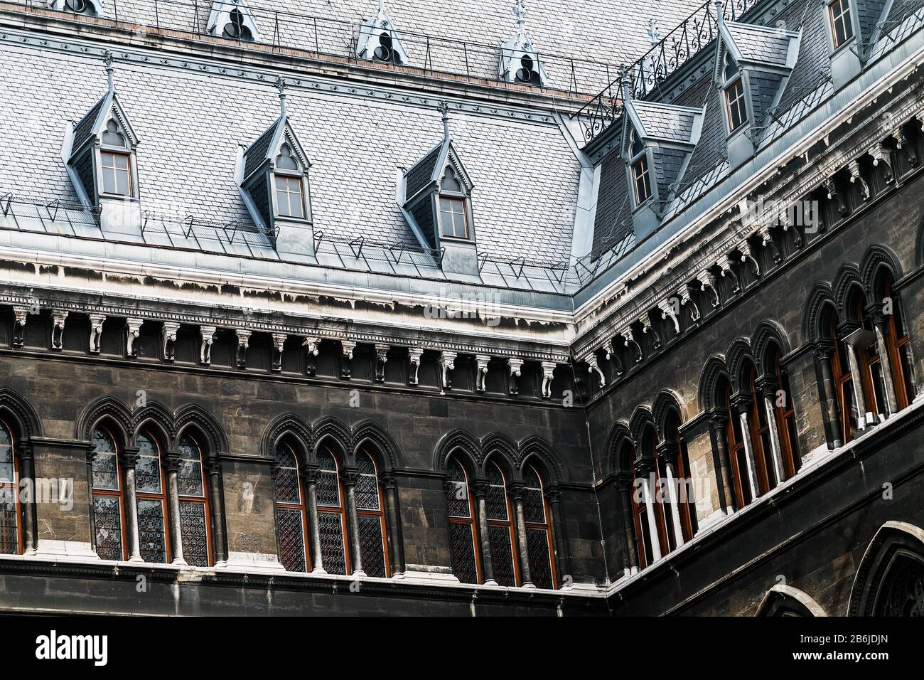Dormer windows on the roofs of gothic building Stock Photo - Alamy
