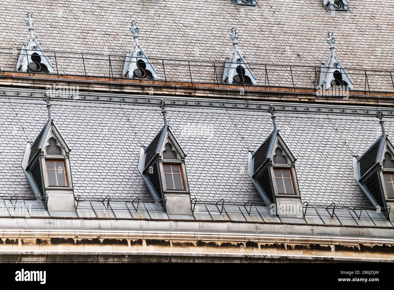 Dormer windows on the roofs of gothic building Stock Photo - Alamy