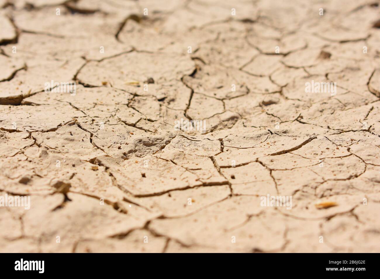 Dry mud brown ground desert texture Stock Photo - Alamy