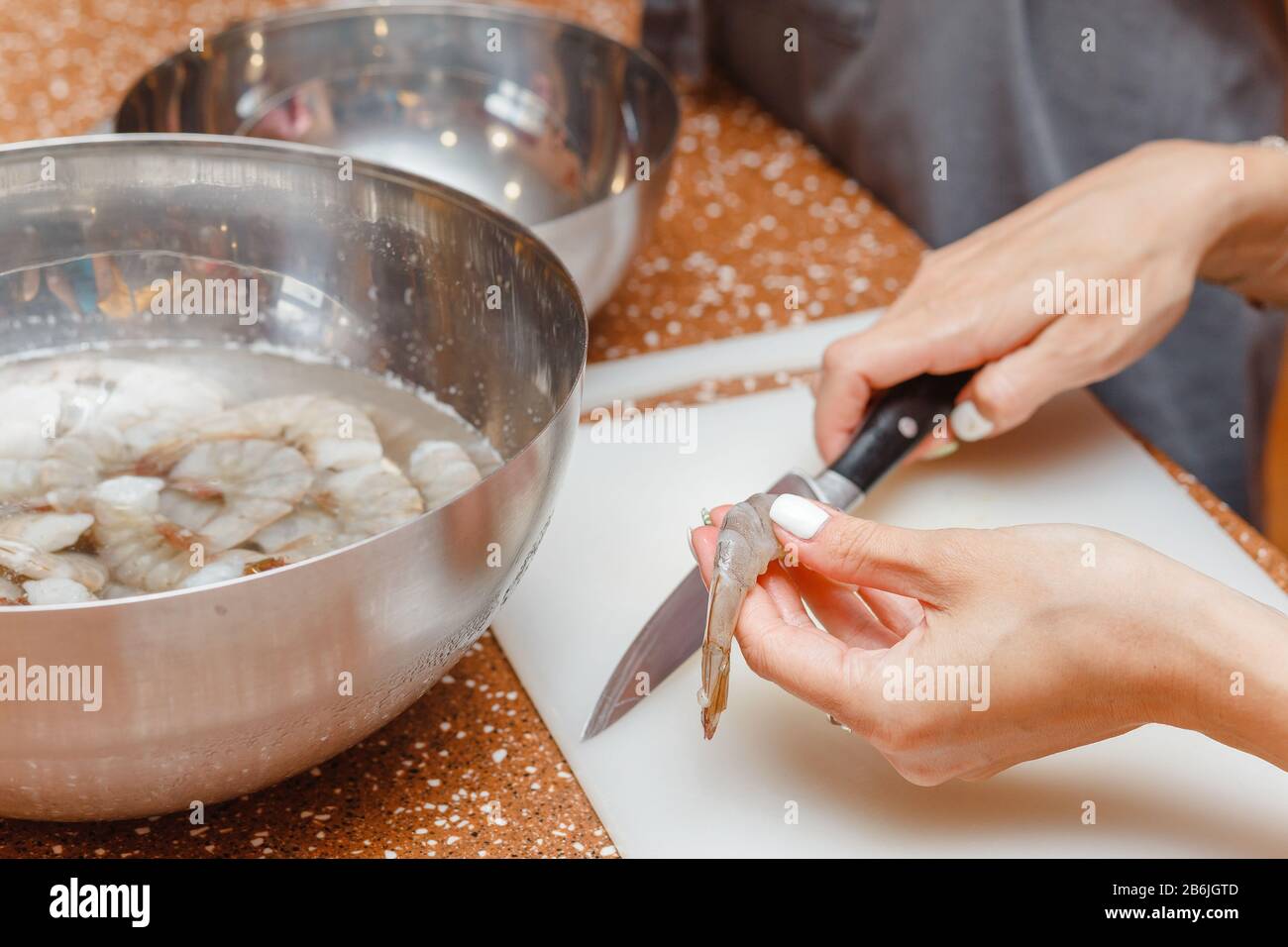 Tiger prawn cleaning hi-res stock photography and images - Alamy