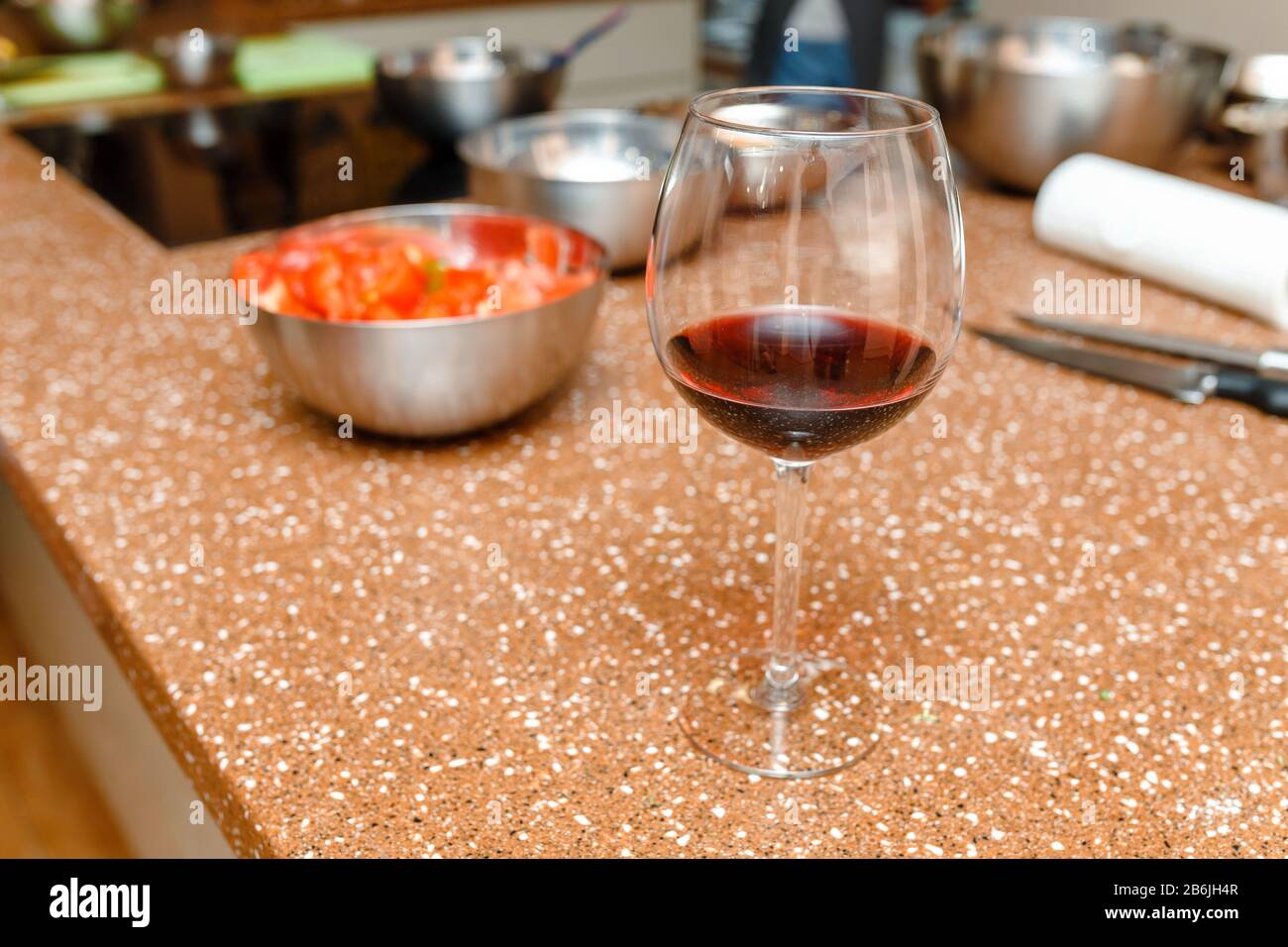 kitchen background with glass of wine Stock Photo - Alamy