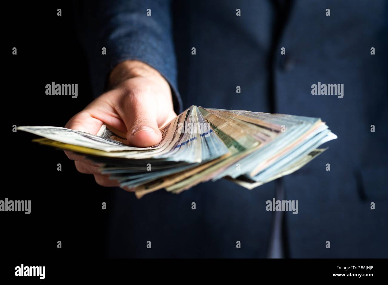 Gesture of holding bills hi-res stock photography and images - Alamy