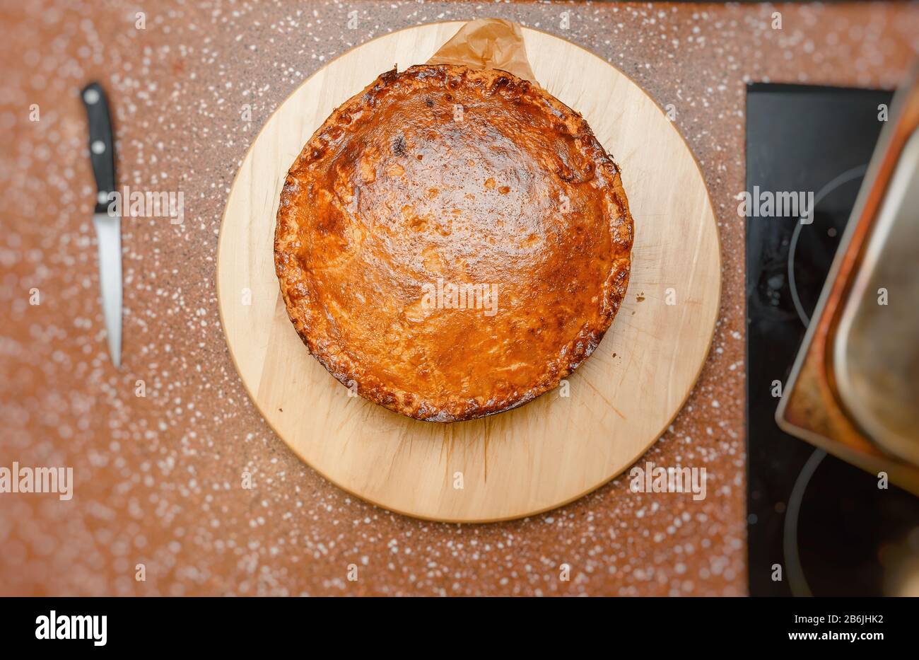 DeliciousPie with on a kitchen table Stock Photo - Alamy