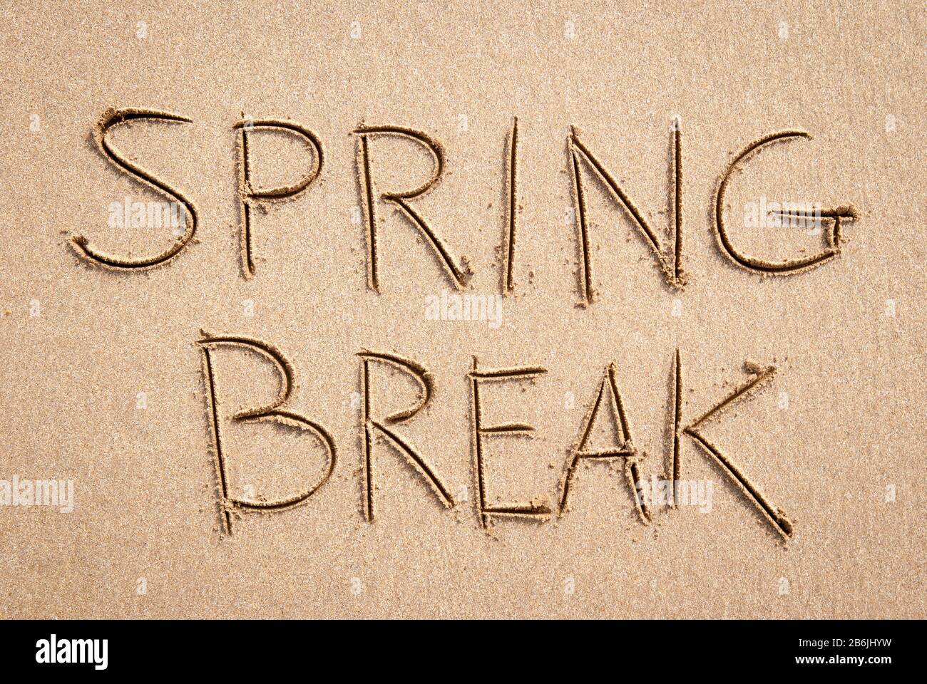 Spring Break message handwritten on the beach in smooth sand Stock ...