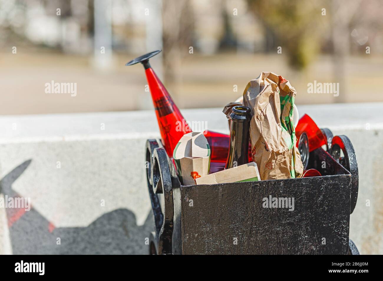 garbage trash bin overflow with waste outdoors Stock Photo - Alamy