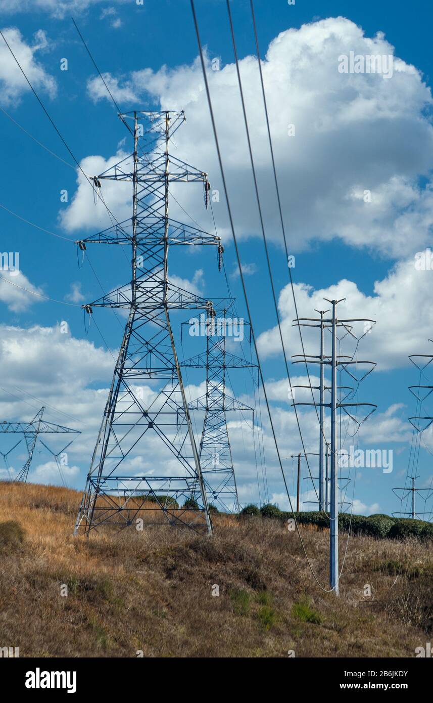 Electric Power Lines Under Blue Skies Stock Photo - Alamy