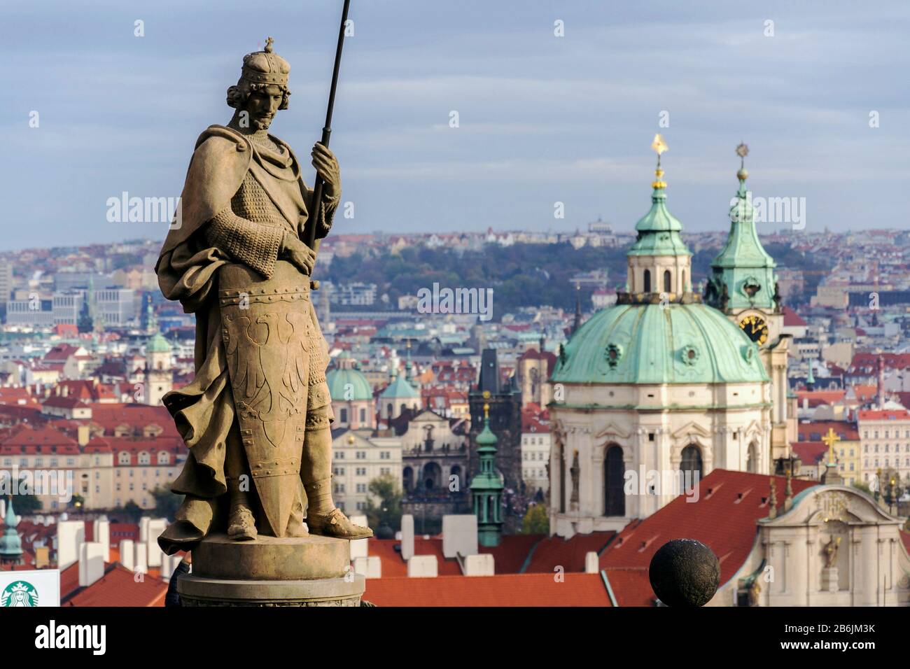 St. Wenceslas Statue in front of the Prague castle, city skyline wit St ...