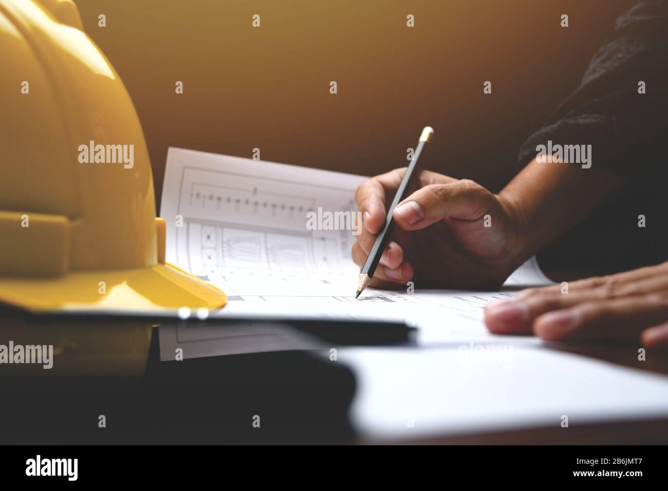 Architect's desk: Engineer works with drawings in a office. Instruments ...