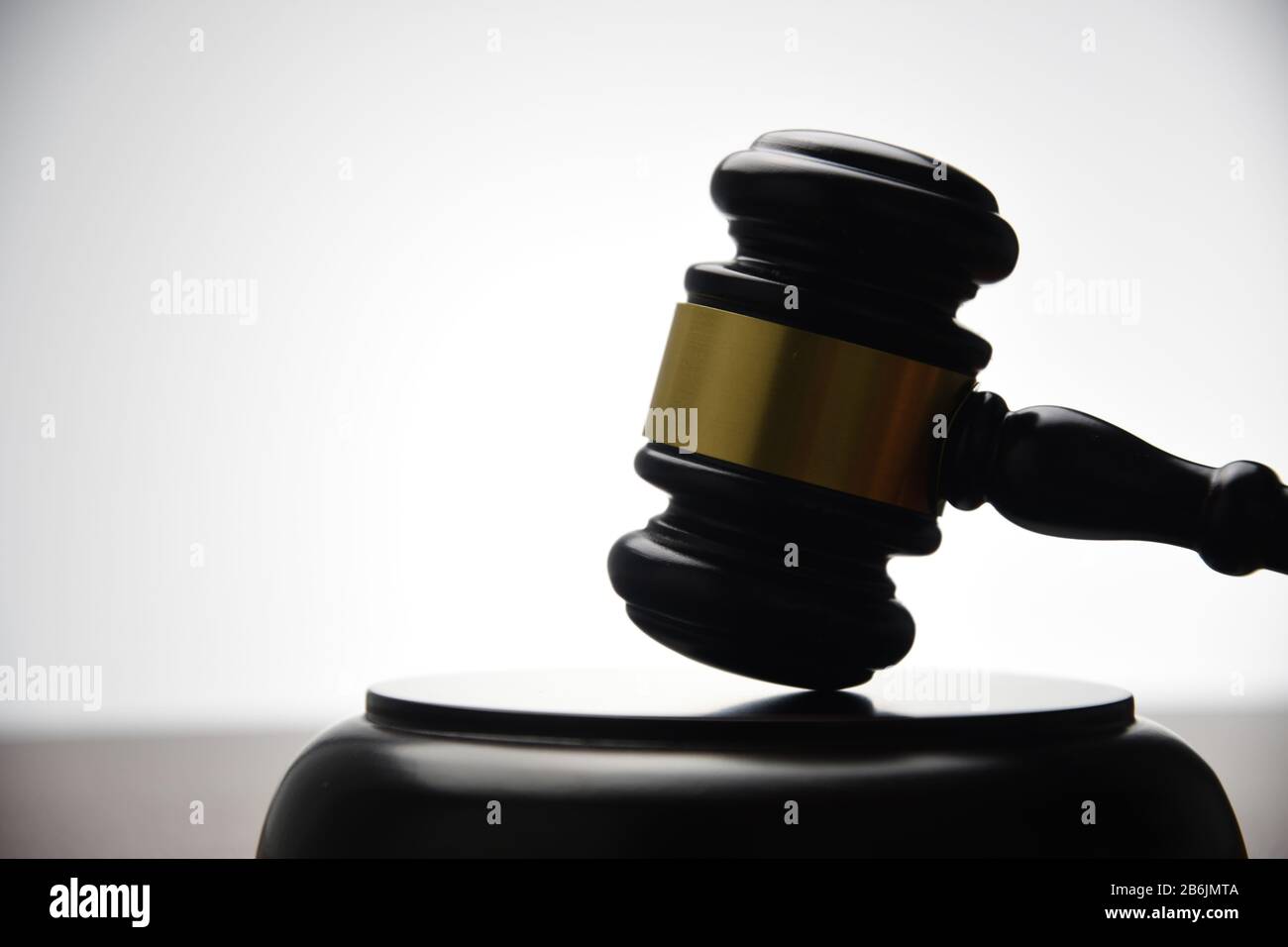 Judge hitting Gavel on white background Stock Photo - Alamy