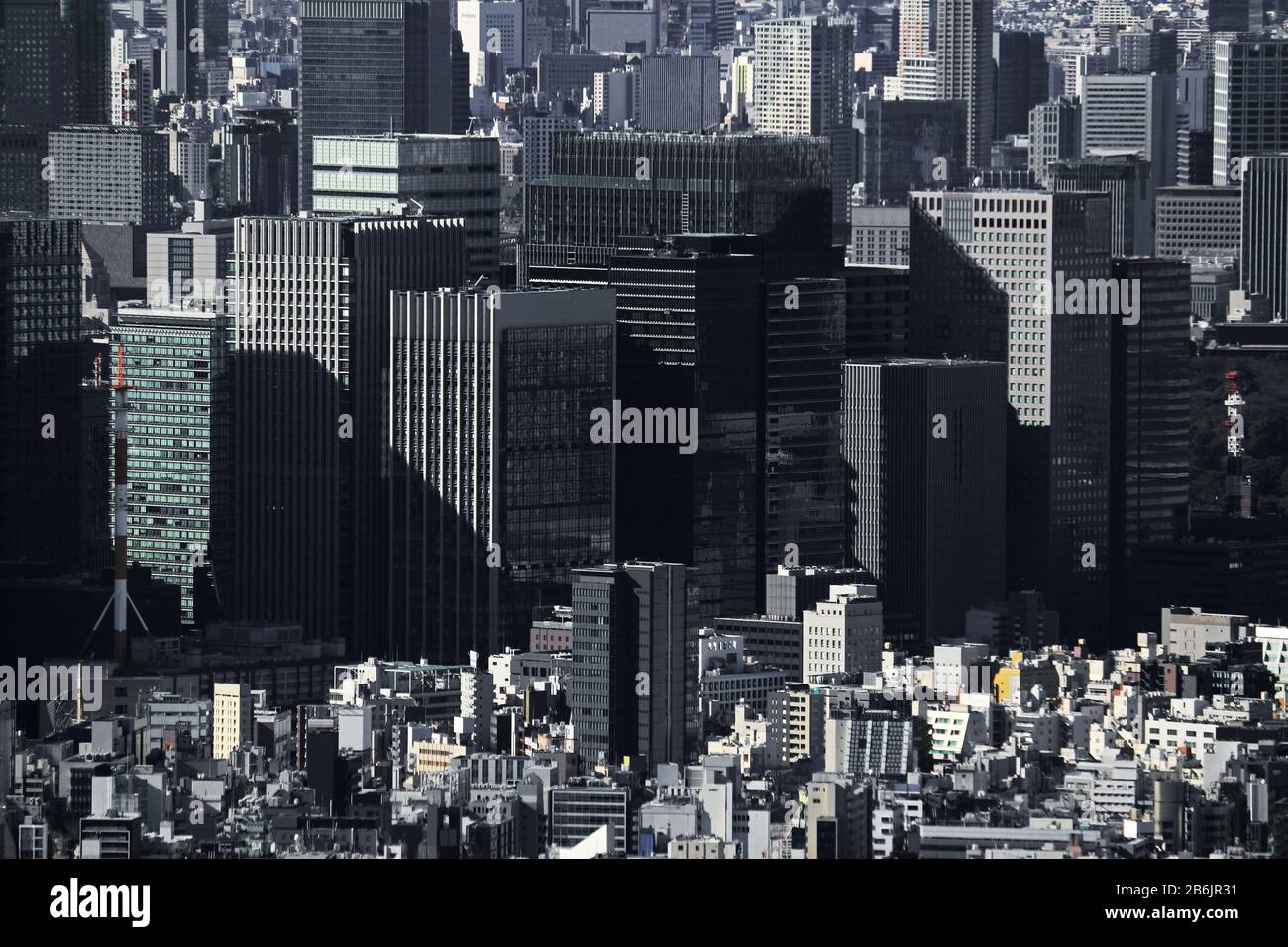 Monochrome scenery of large and small buildings in Otemachi from Kanda ...